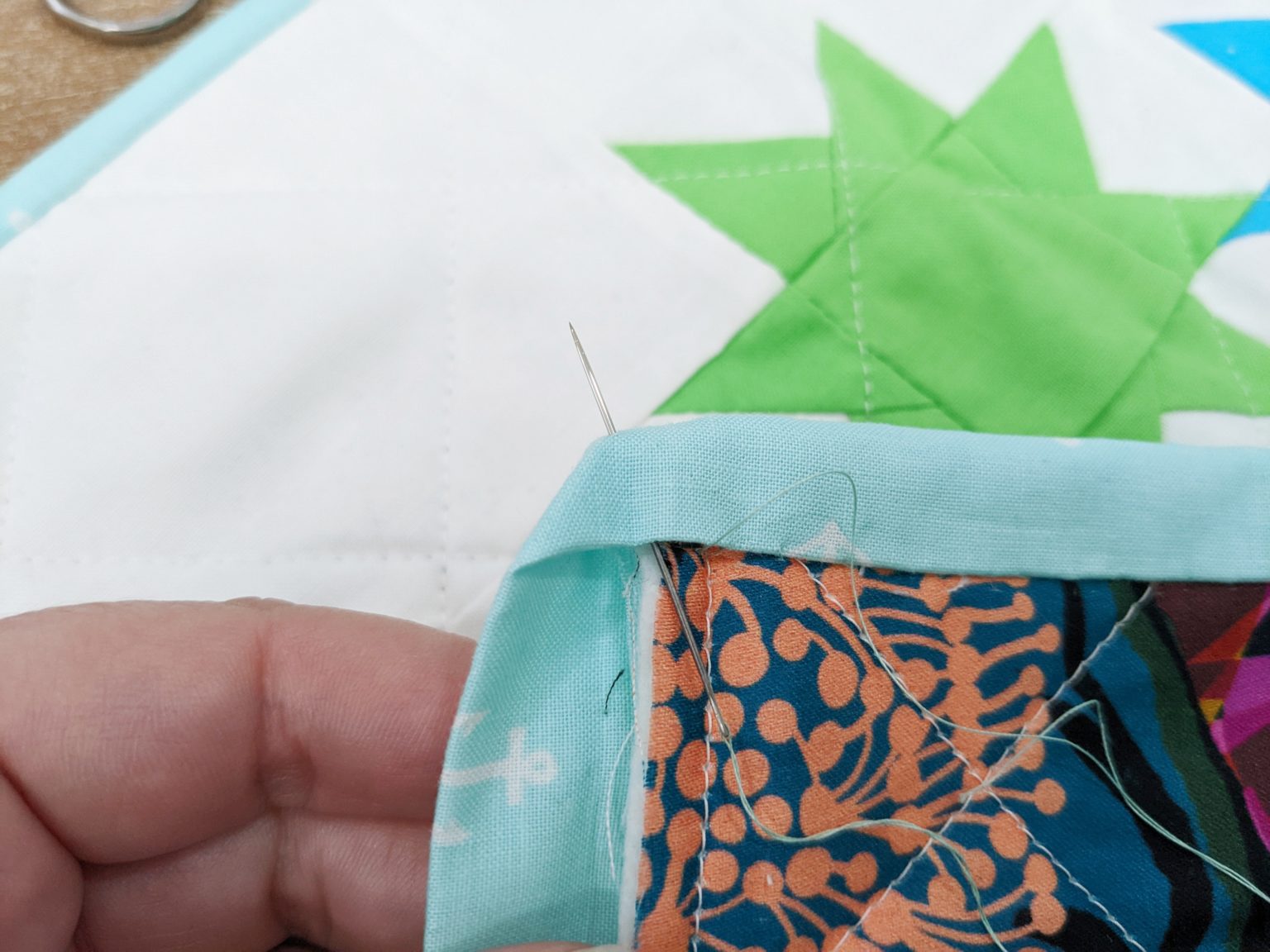 Perfect Hand Binding Tips – slightly biased quilts